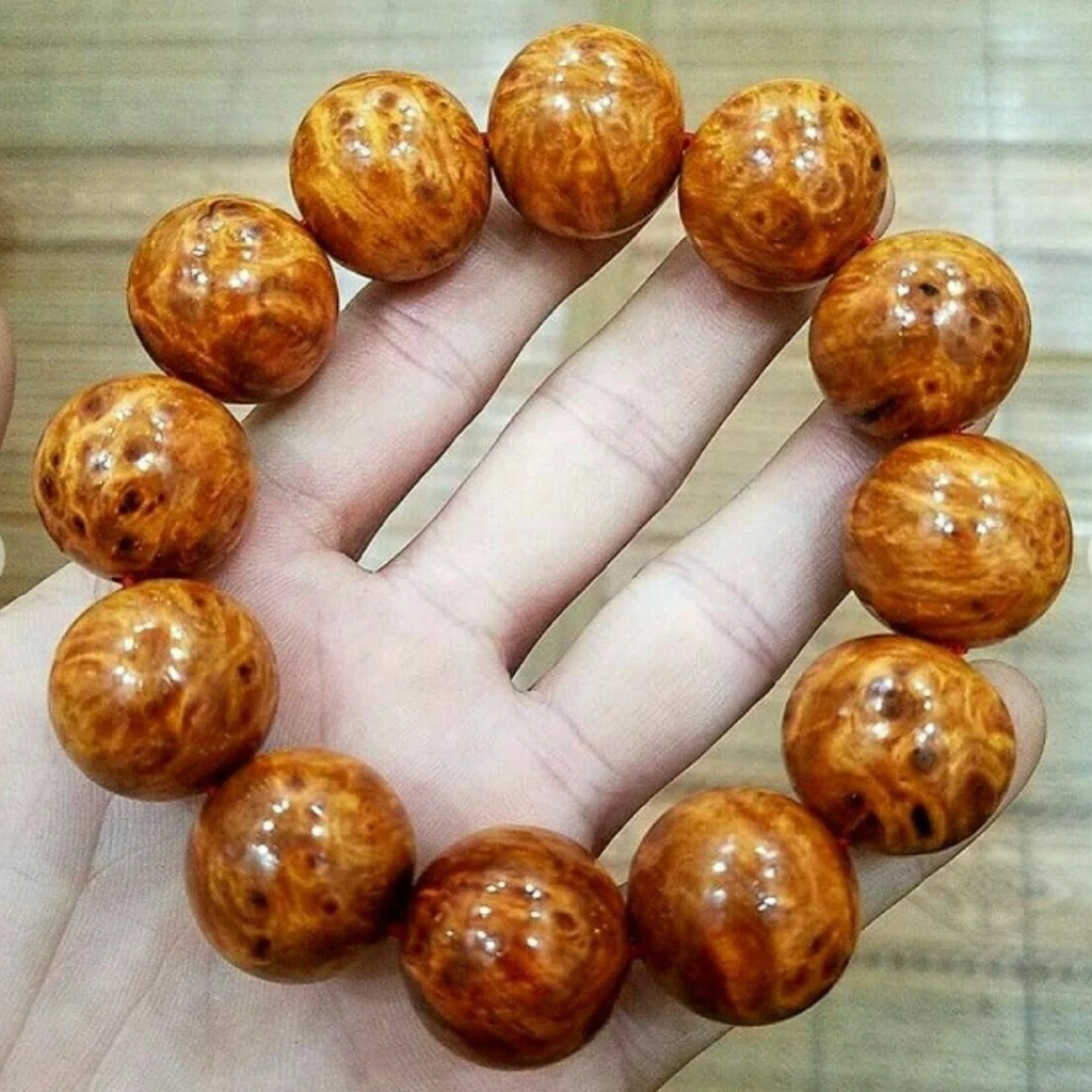 Vòng tay nu huyết long size 12ly hạt tròn Cửa hàng Tây Bắc