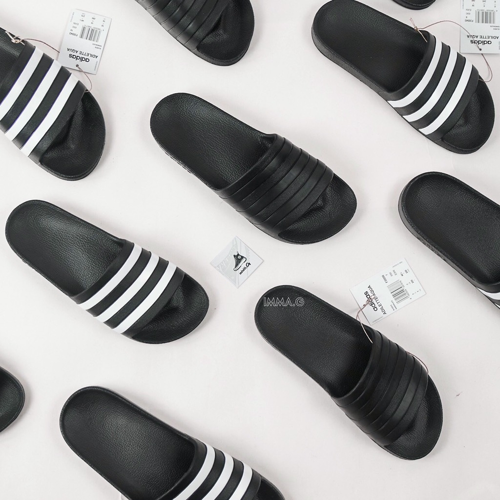 DÉP ADIDAS QUAI NGANG TRẮNG ĐEN - F35543